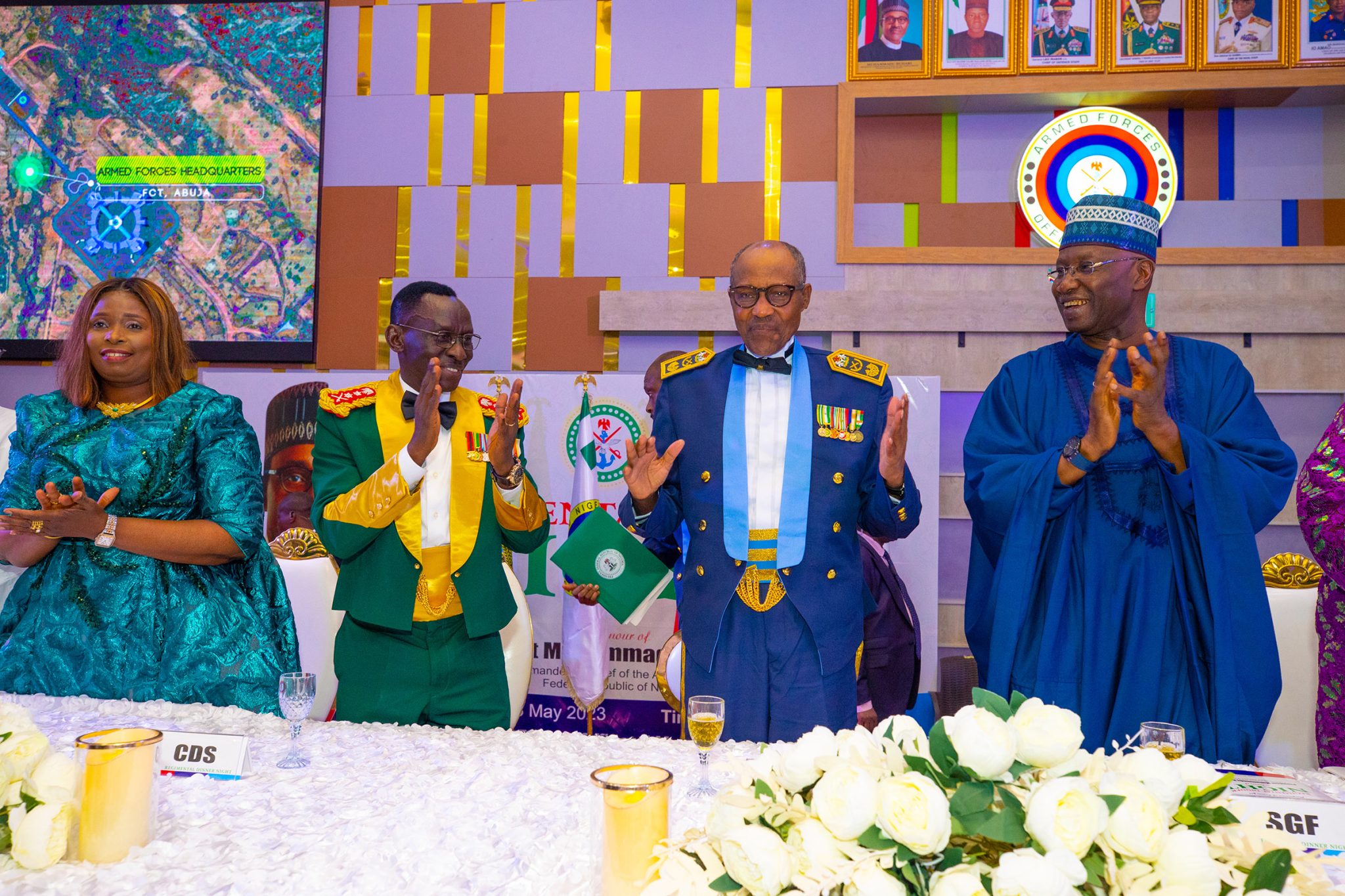 The Day in Pictures: Pres. Buhari Attends Regimental Dinner Night | Per ...